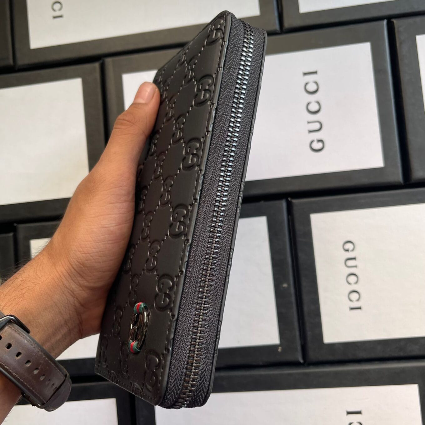 Gucci Reverse GG Embossed Matte Leather Wallet - TheLuxuryTag