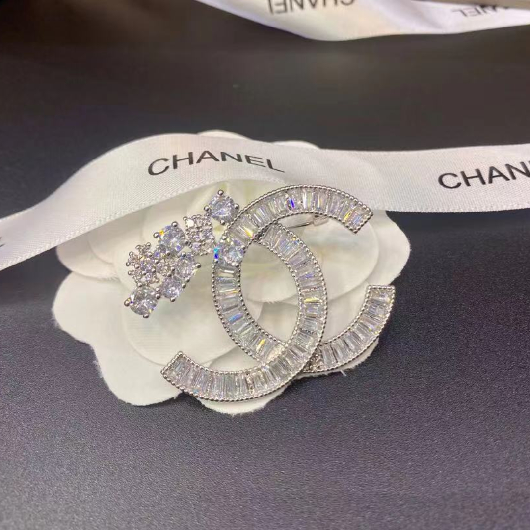 Chanel Stone Logo Brooch - TheLuxuryTag