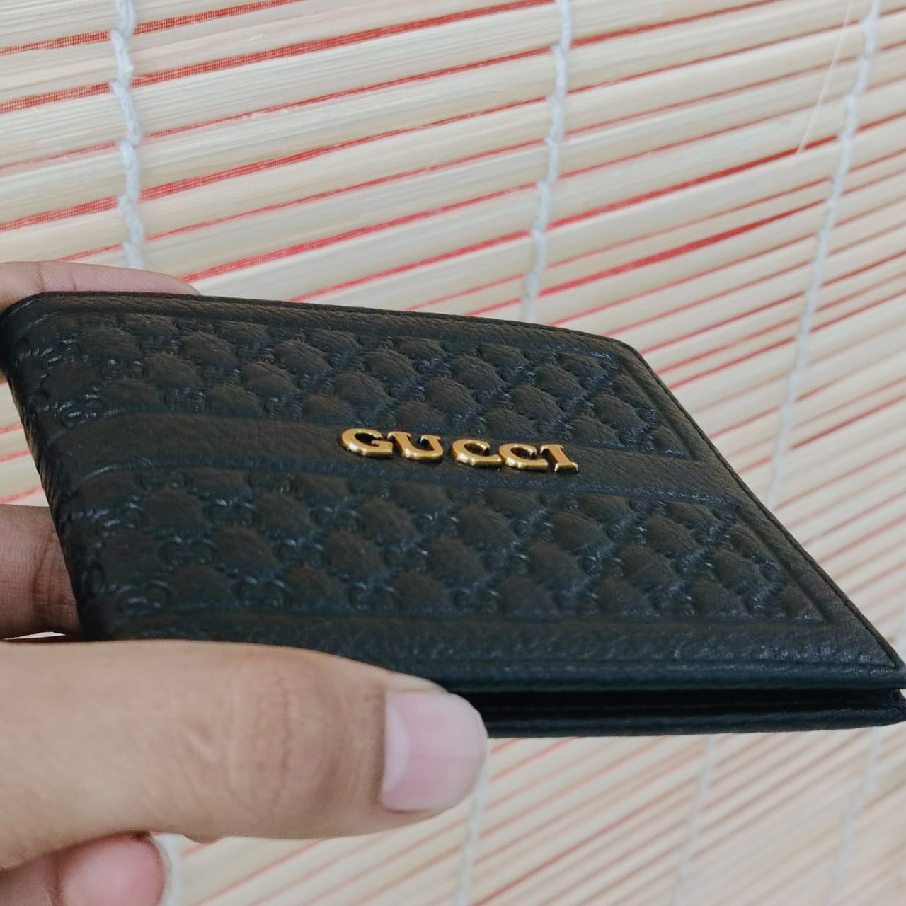 Gucci GG Embossed Black Leather Men's Wallet - TheLuxuryTag