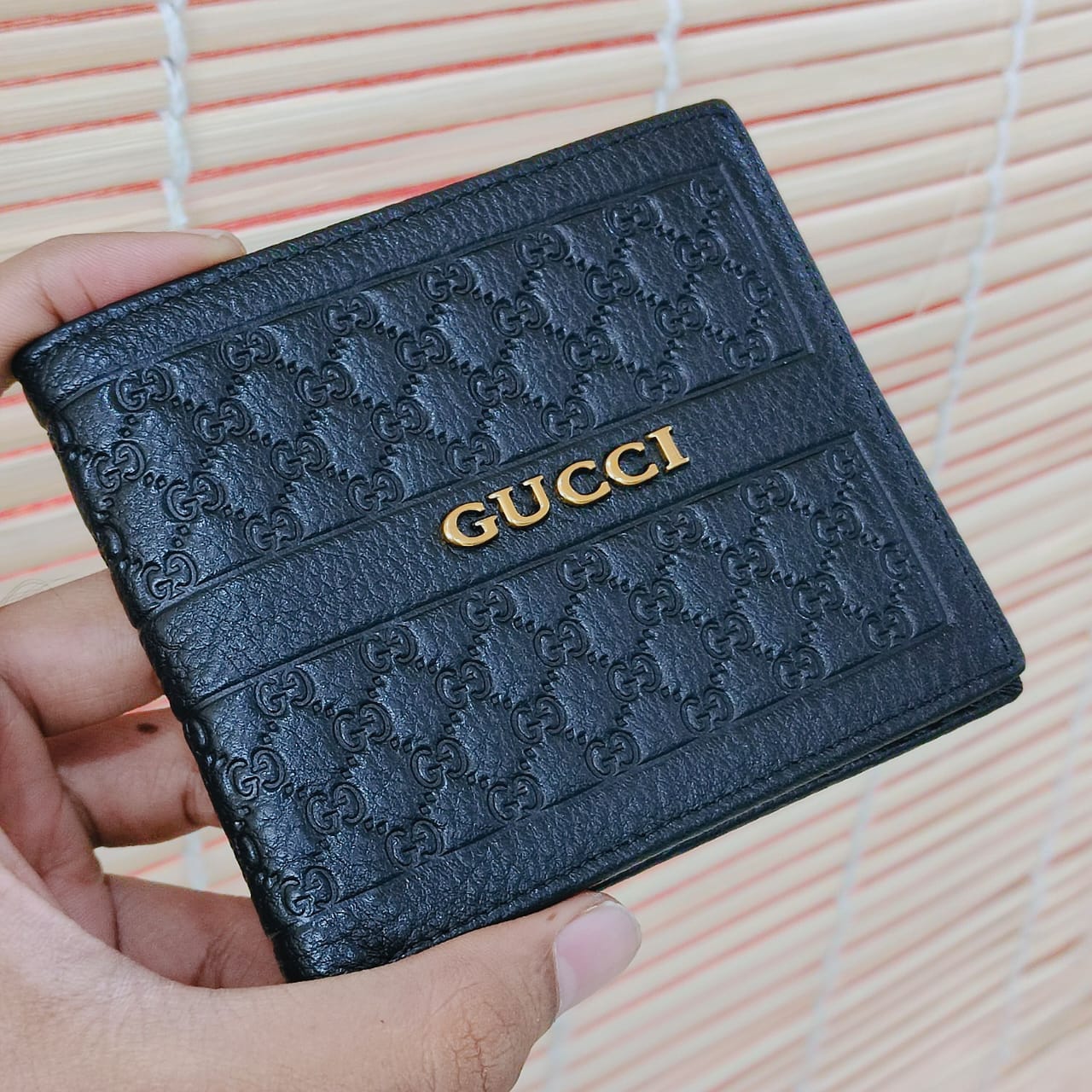 Gucci GG Embossed Black Leather Men's Wallet - TheLuxuryTag