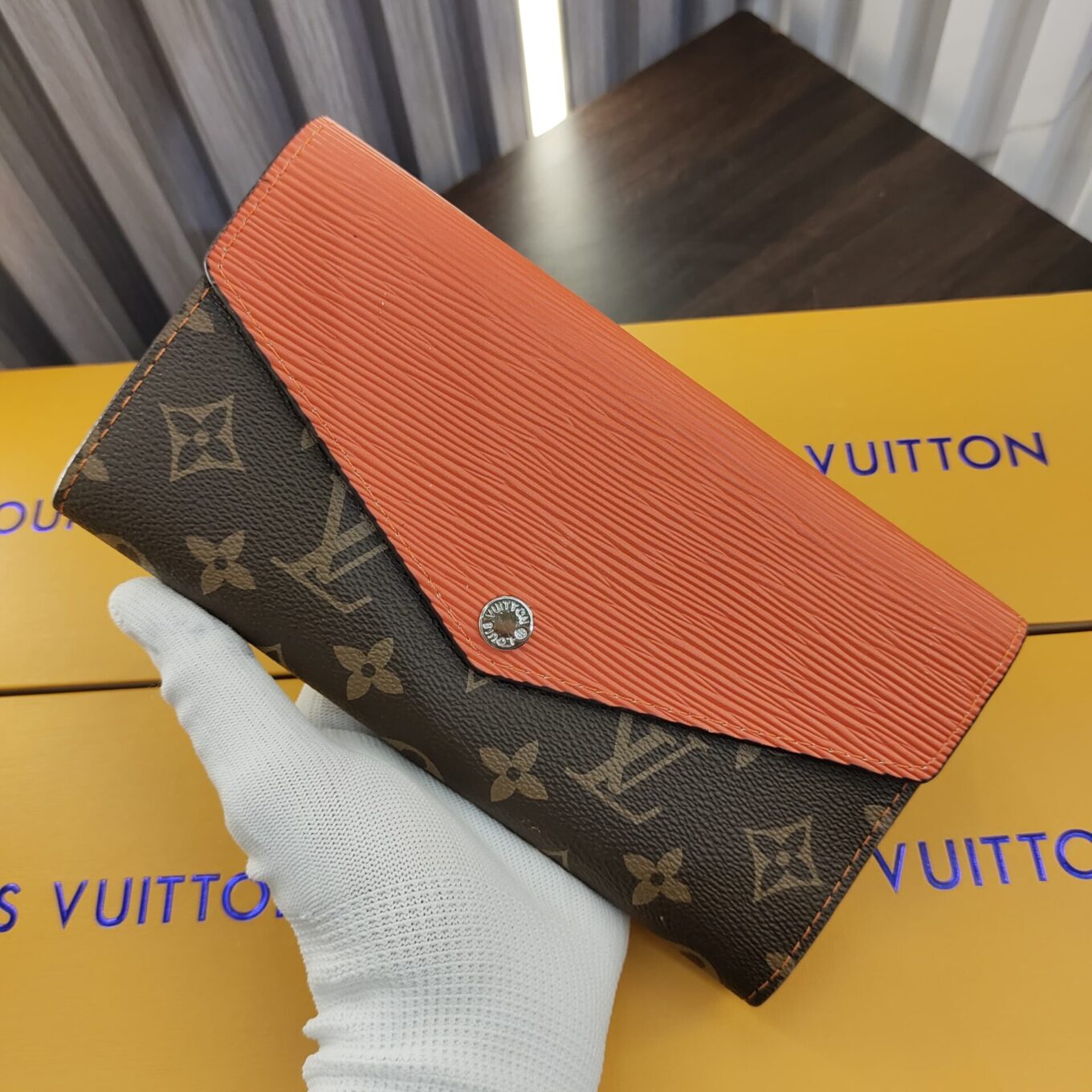 Louis Vuitton Orange Pallas Wallet - TheLuxuryTag