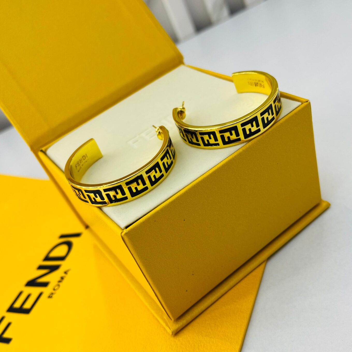 Fendi FF Black Hoop Earring - TheLuxuryTag