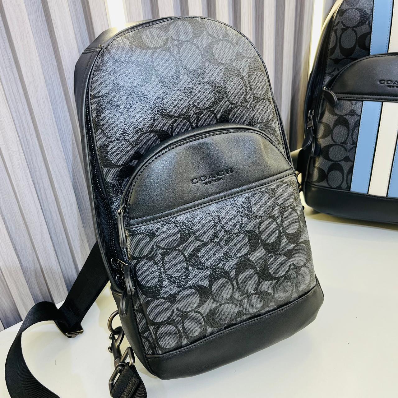 Coach Black Crossbody Sling Backpack - TheLuxuryTag