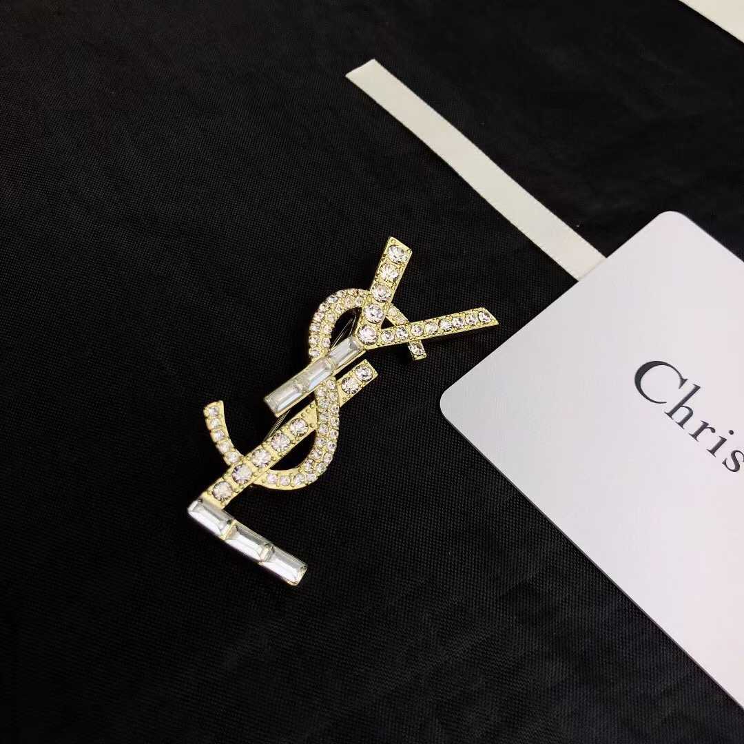 YSL Classic Goden Studded Logo Brooch - TheLuxuryTag