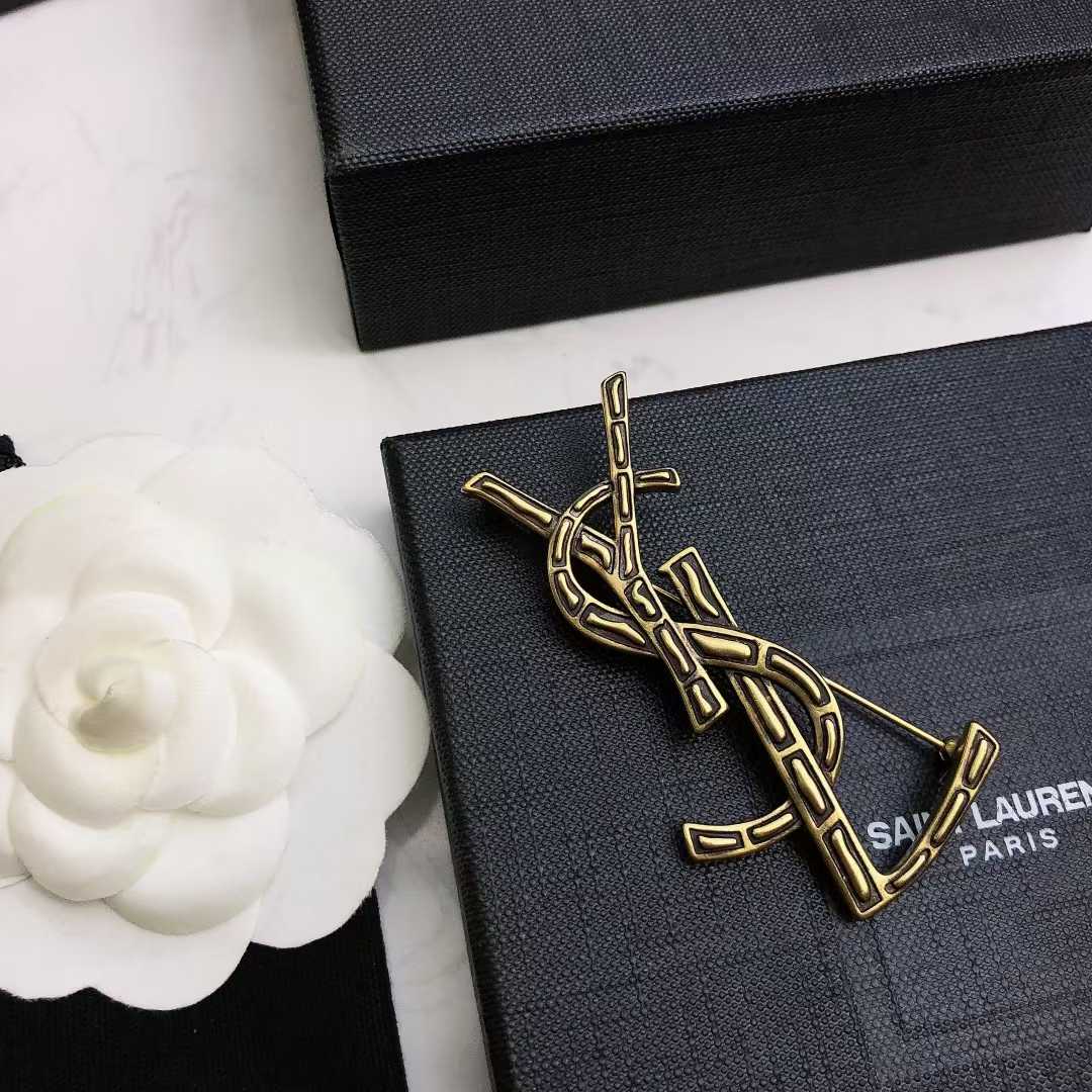 YSL Classic Rusted Logo Brooch - TheLuxuryTag